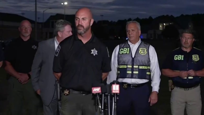 Georgia school shooting: Suspect's father arrested on charges including ...