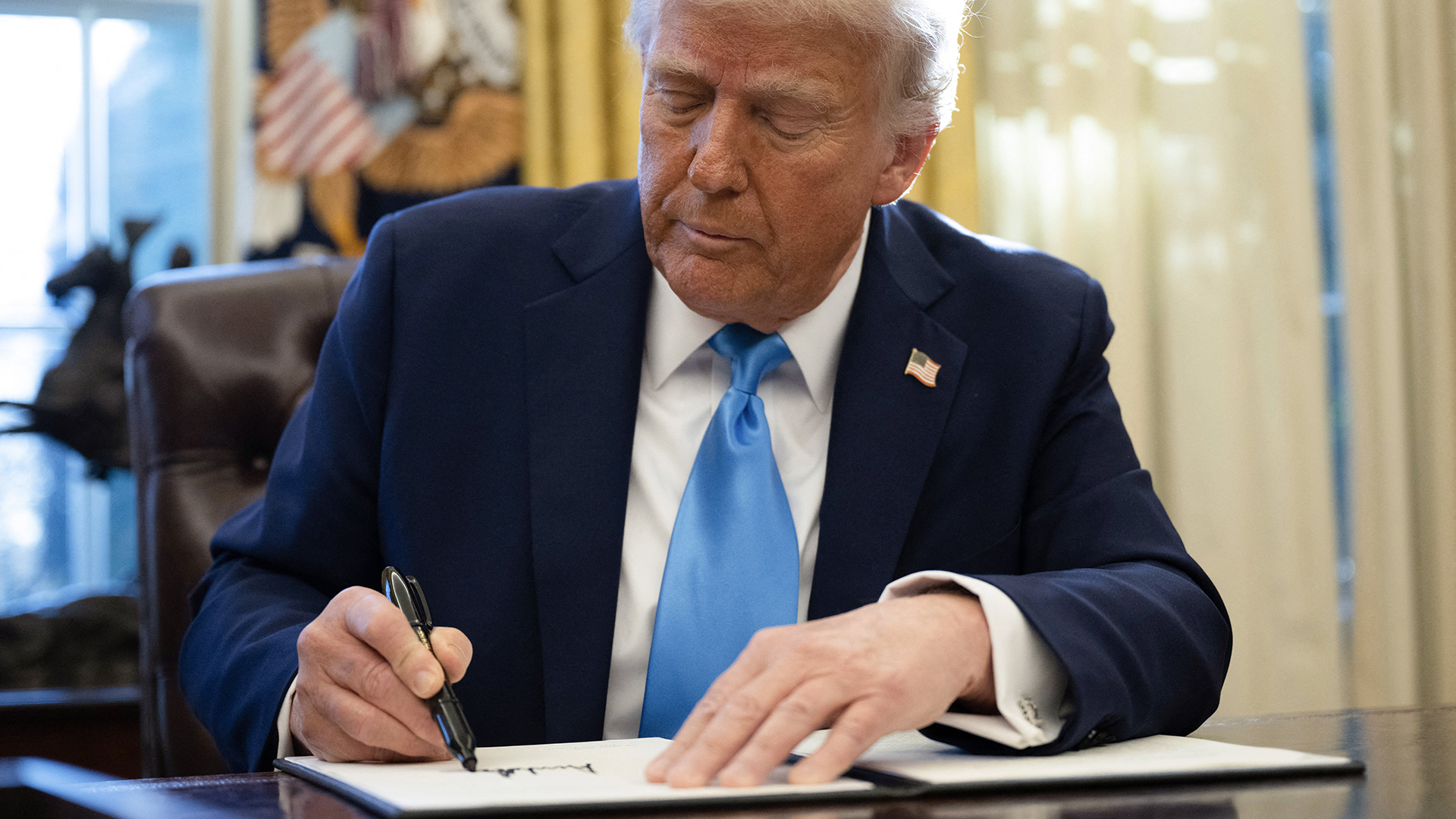 Trump signs executive order banning trans women from women’s sports