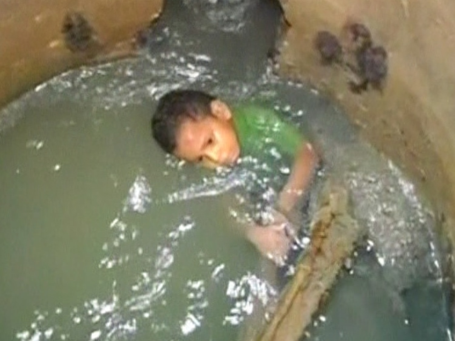 kid falls down sewer