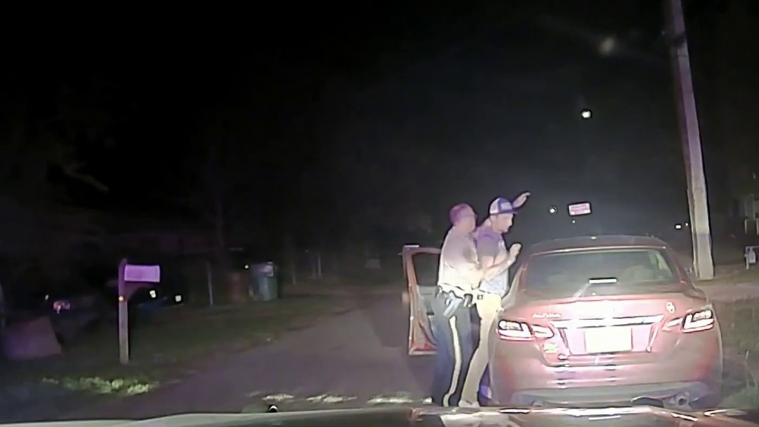 guy in cop car interview