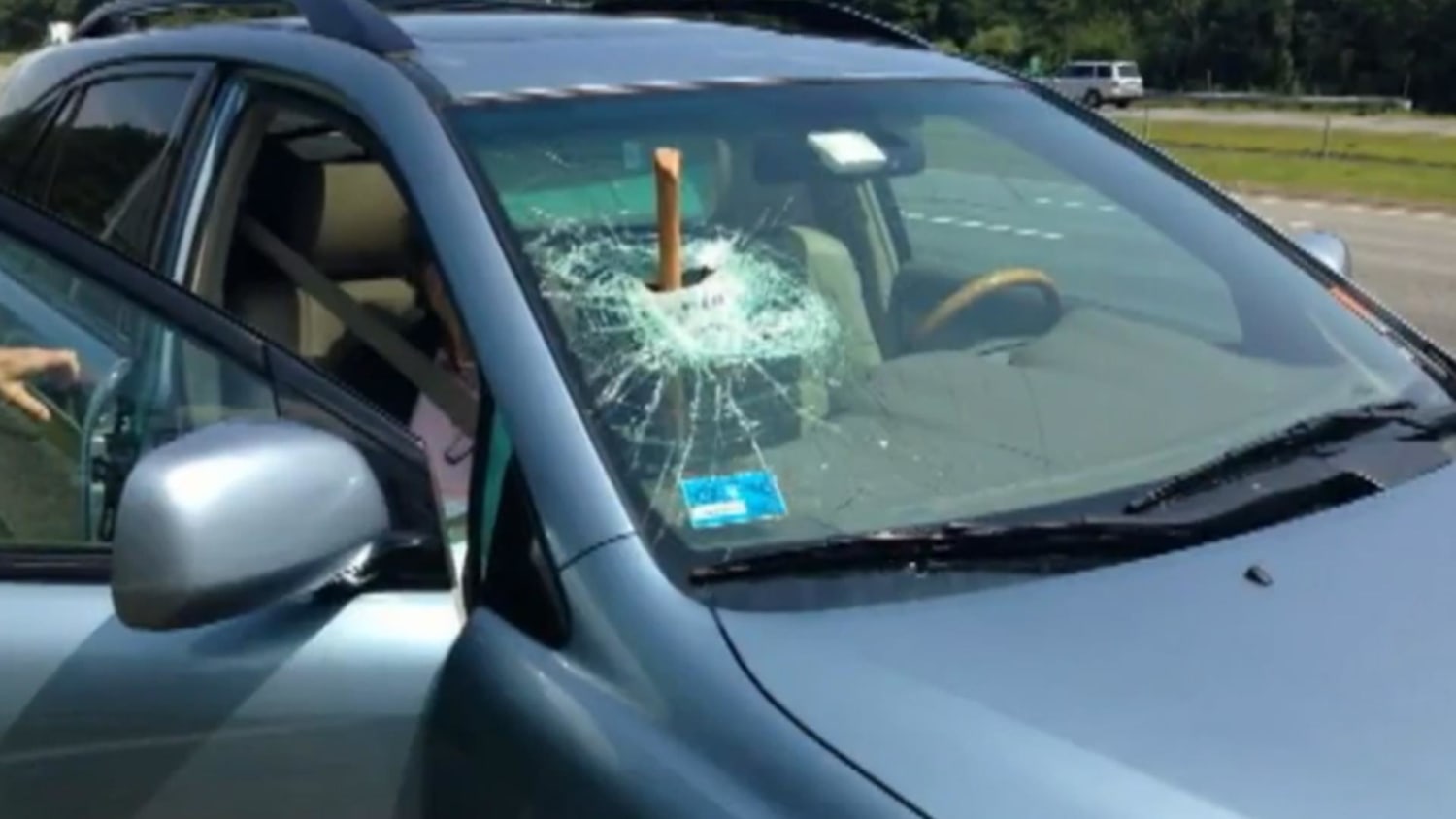 axe through windshield