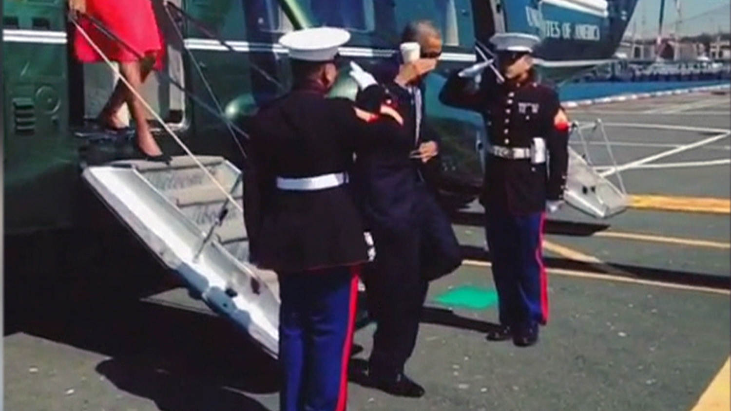 obama saluting