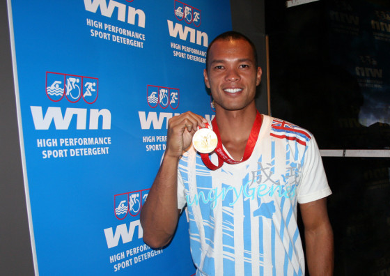 Olympian Bryan Clay takes off his shirt to WIN