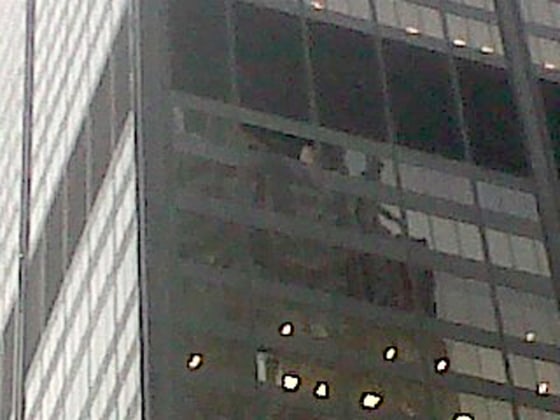 Storms rip windows off tower, kill motorist