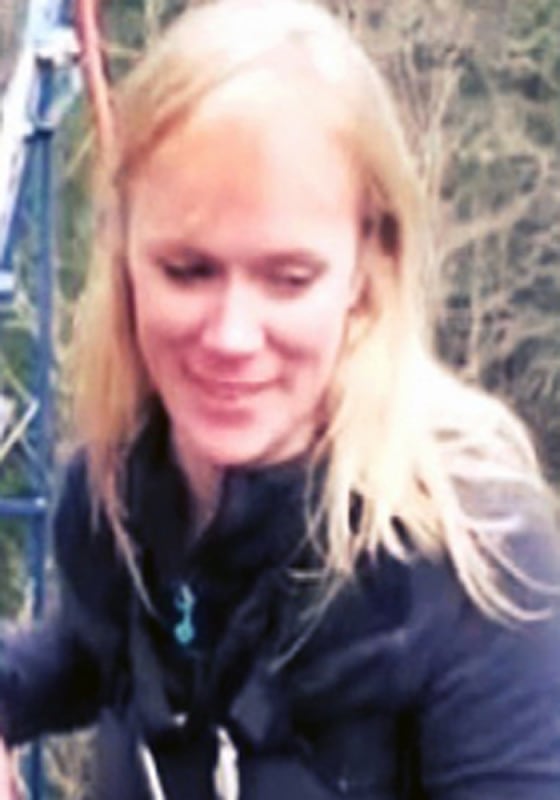 Woman arrested in yoga clothing shop slaying