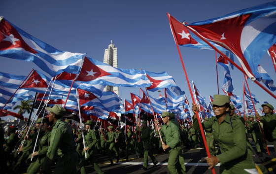 Cubans mark May Day, await details of change
