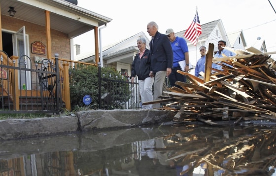 Biden visits flood-hit Pa. as residents beg for protection