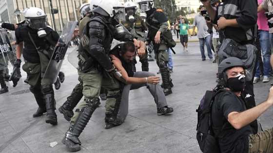 Greek riot police fire tear gas at Athens protesters
