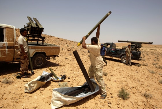 Libya rebels plan assault on key western town