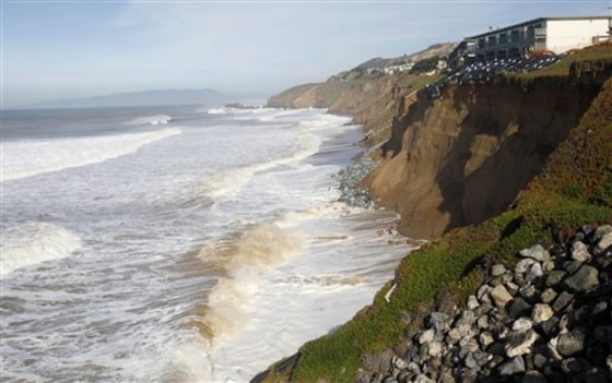 Storm-hit cliff crumbles, forcing evacuations