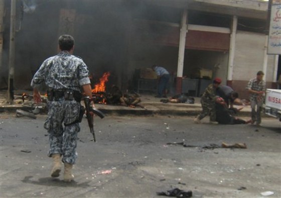 Police: Female suicide bomber kills 15 in Iraq