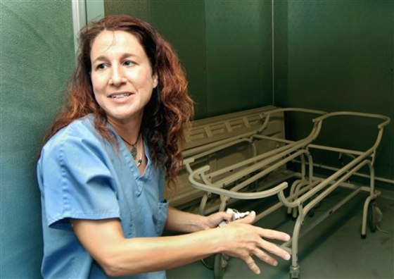 Doctor in baby murder case stands by autopsy