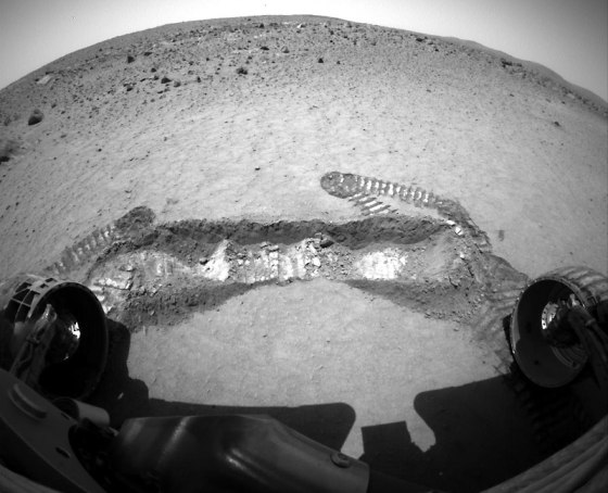 Spirit digs its own trench on Mars