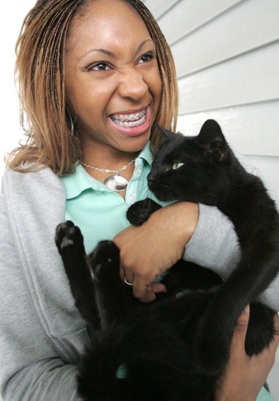 Katrina survivor, lost cat reunited at last