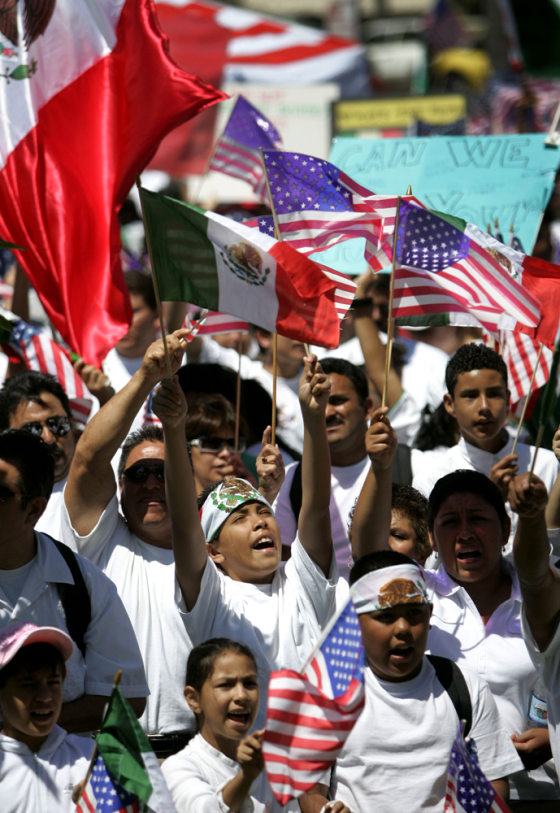 Tens of thousands rally for immigrant rights