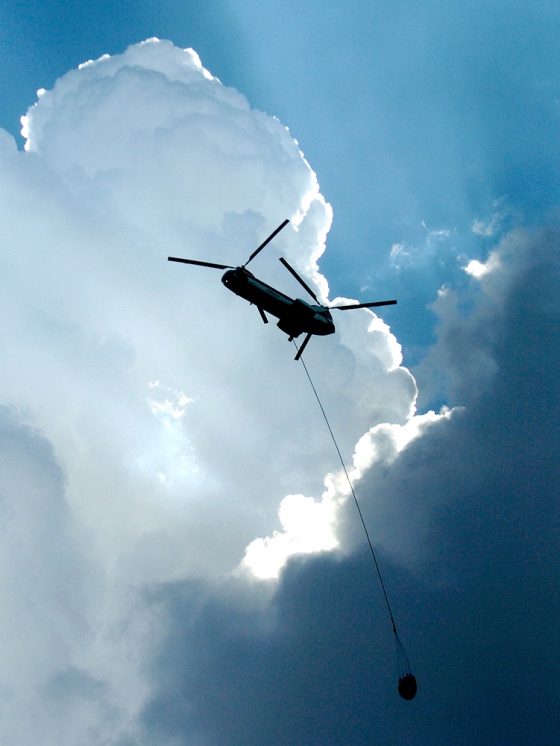 Storms may hamper battle against Calif. fires