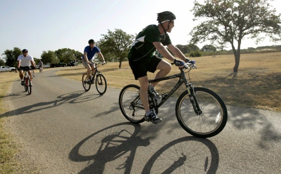 Bush, at 60, still puts (bike) pedal to the metal