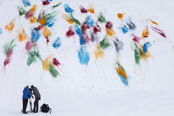 Mountain Canvas: Artist Paints in Snow