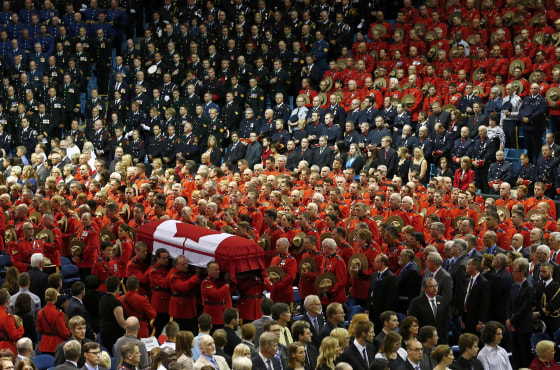 Thousands Mourn Canadian Mounties at Regimental Funeral