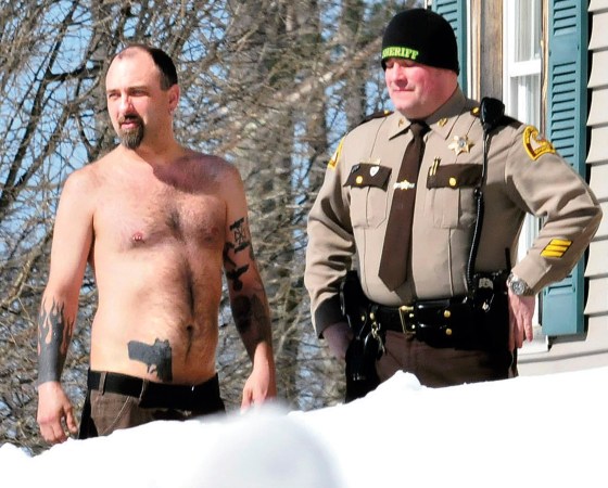 Man With Gun Tattoo Had Real Gun in Waistband