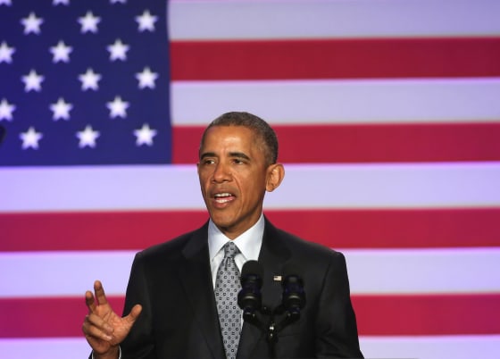 Obama Defends Economic Record to Democrats