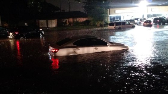 Cars Battle High Waters After Flash Floods in Houston