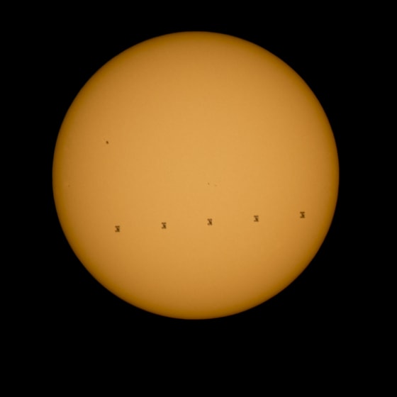 Space Station Crosses Sun's Face in Stunning Photo from Earth
