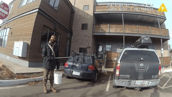 Colorado cop who pulled gun on man picking up trash outside his home ...