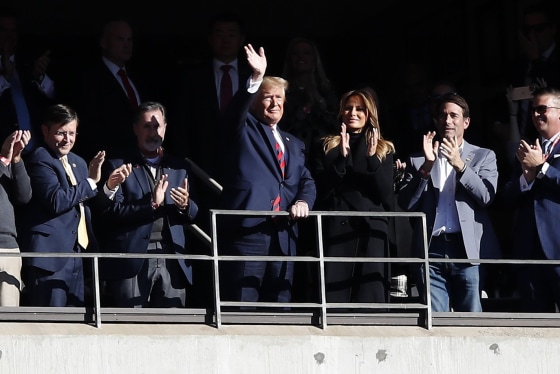 Trump soaks in Deep South cheers at college football matchup