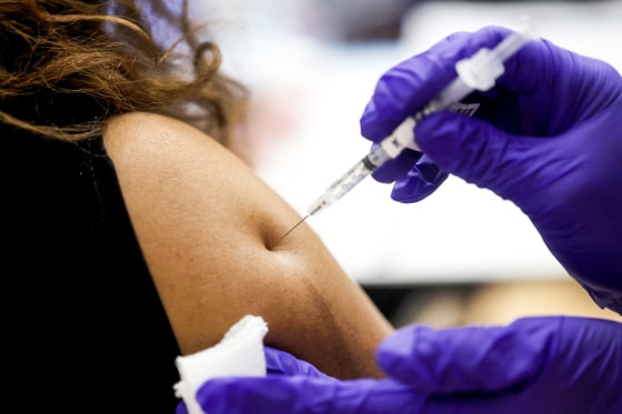 Should people wait until the fall for a second booster? CDC panel ...