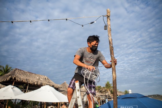 Mexican LGBTQ group rallies support for beach 'paradise' battered by storm