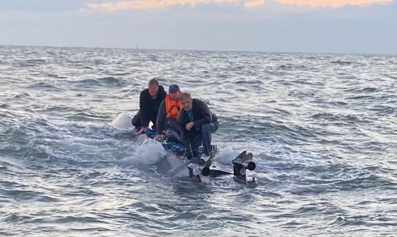 Coast Guard Rescues Men Clinging To Hull Of Capsized Boat Off South