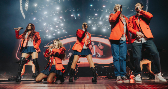 RBD Fans Honor The Group's Telenovela 'Rebelde' With Concert Outfits