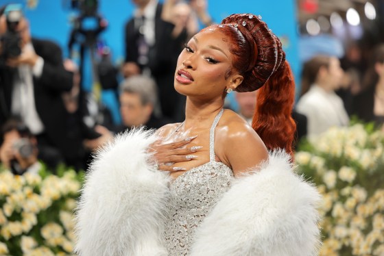 Megan Thee Stallion breaks no-phone rule at Met Gala to review the food