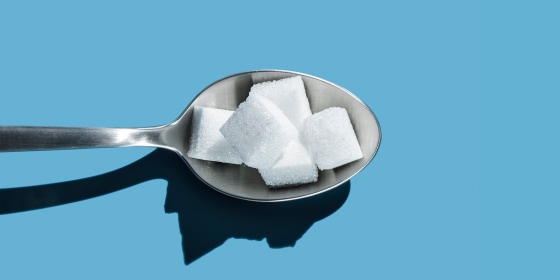 Signs You're Eating Too Much Added Sugar, According To A Dietitian
