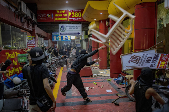 Dozens arrested and hurt in clashes with police near Philippine ...