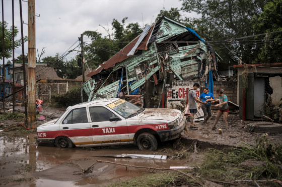 At least 37 dead in Mexico as heavy rain sets off floods and landslides