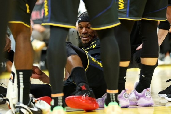 Warriors star Jimmy Butler goes down with right knee injury against ...