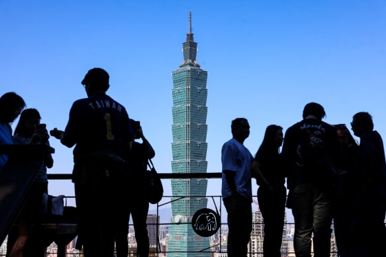 An American is climbing Taipei 101 with no ropes, live on TV. It's ...
