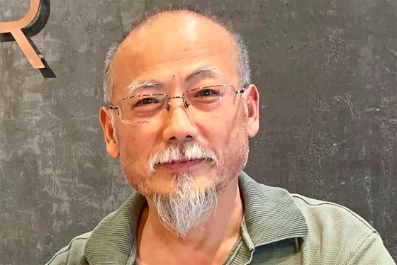 Chinese dissident is detained in South Korea after fleeing by ...