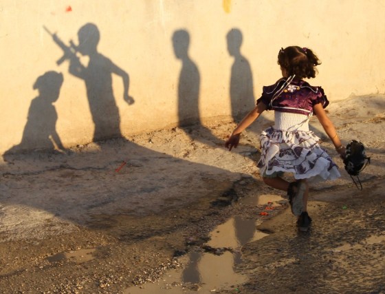 Children cast shadows in West Bank