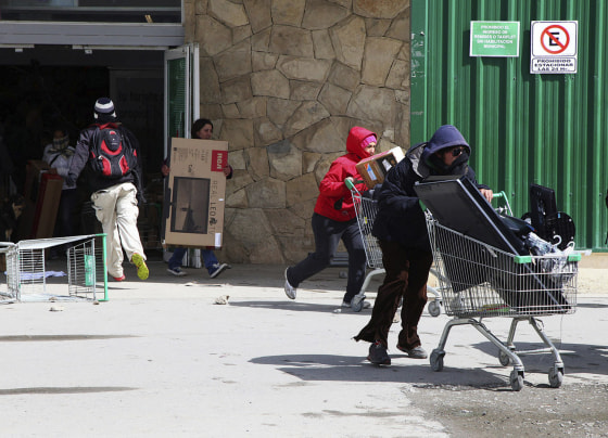 Masked bandits loot a supermarket in Argentina