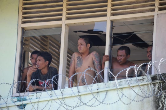 Indonesia police battle to regain control of Bali prison