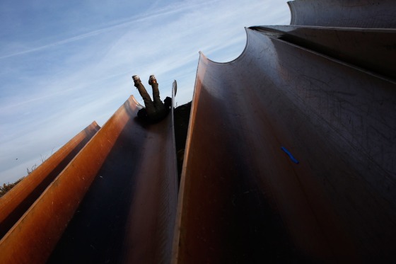 Construction materials serve as playground in gypsy settlement
