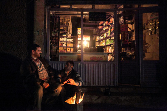 Living in rubble, through dark and cold nights in Syria