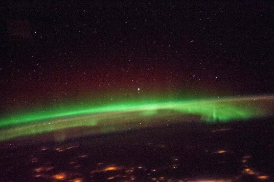 Holiday calendar: Red and green lights glow in space