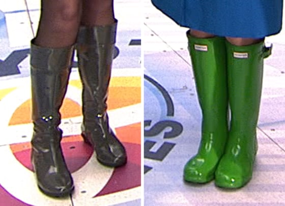 Anchors stay dry in cute wellies to chat with Bieber