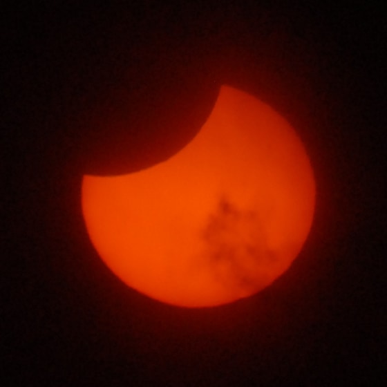 Solar eclipse darkens Black Friday