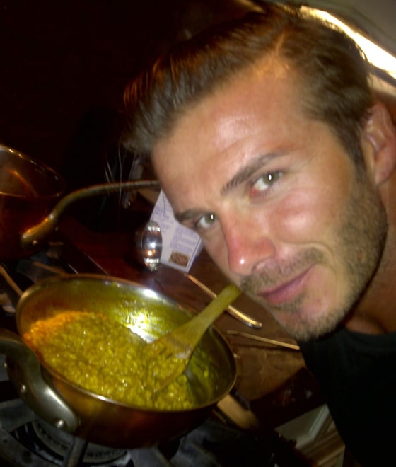 David Beckham gets hot in the kitchen