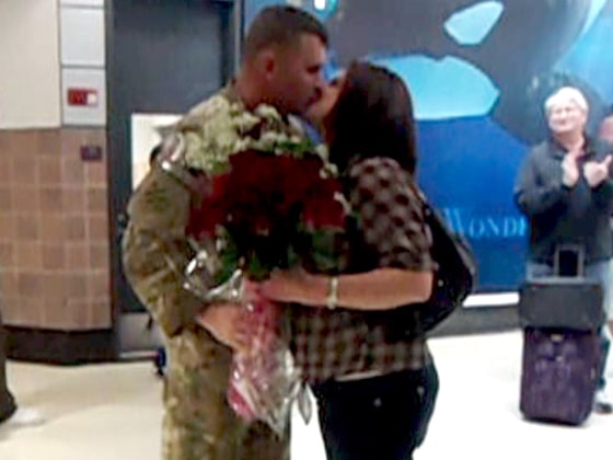 Strangers help soldier surprise wife with 20 roses for 20th anniversary